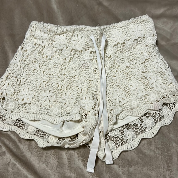 Shorts | Cream Colored Shorts Covered In Flowers With An Adjustable Tie ...